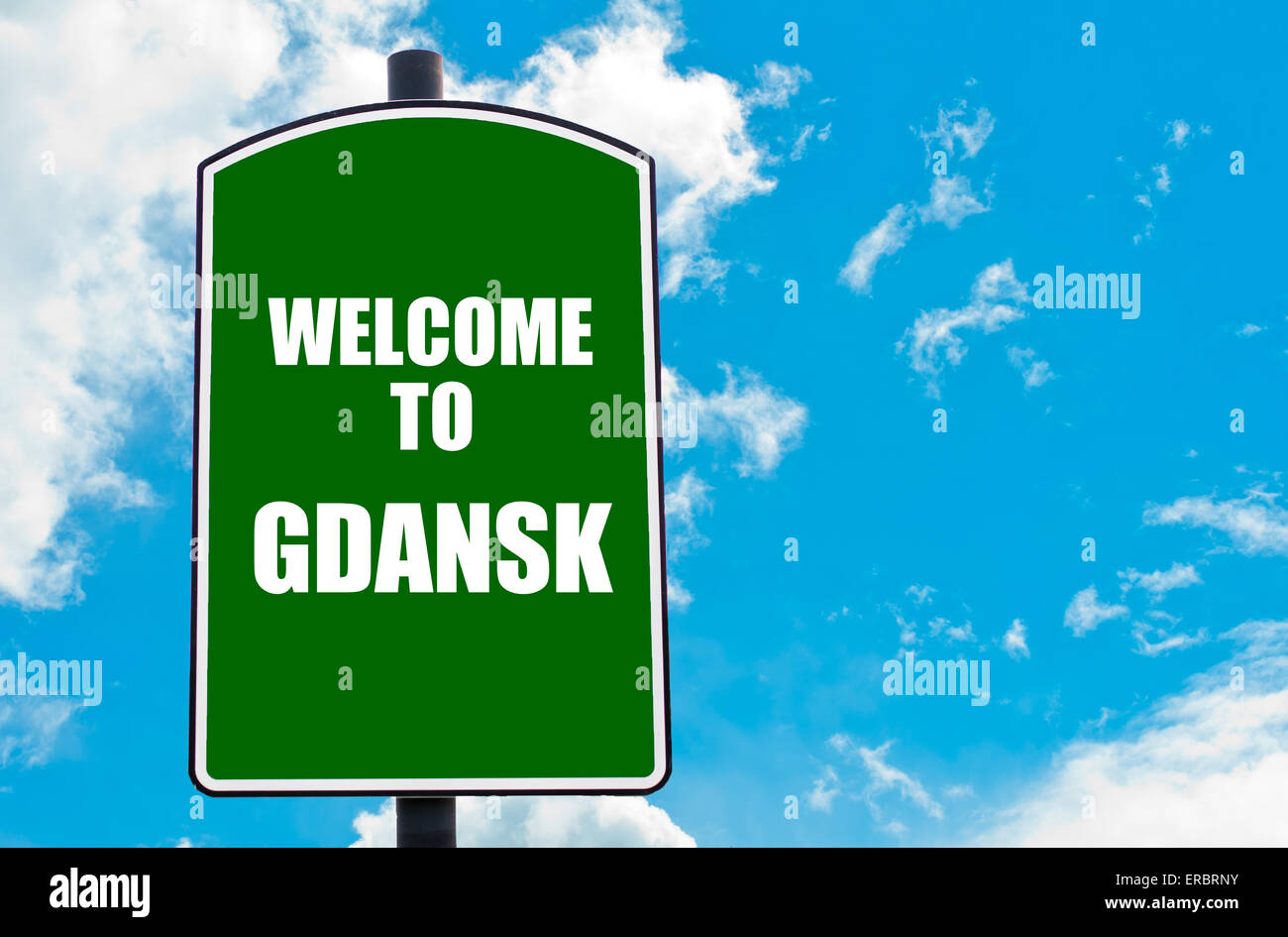 Green road sign with greeting message WELCOME TO GDANSK isolated over ...