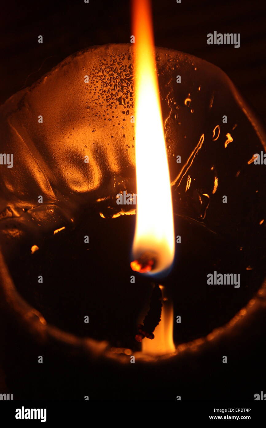 A burning candle Stock Photo - Alamy