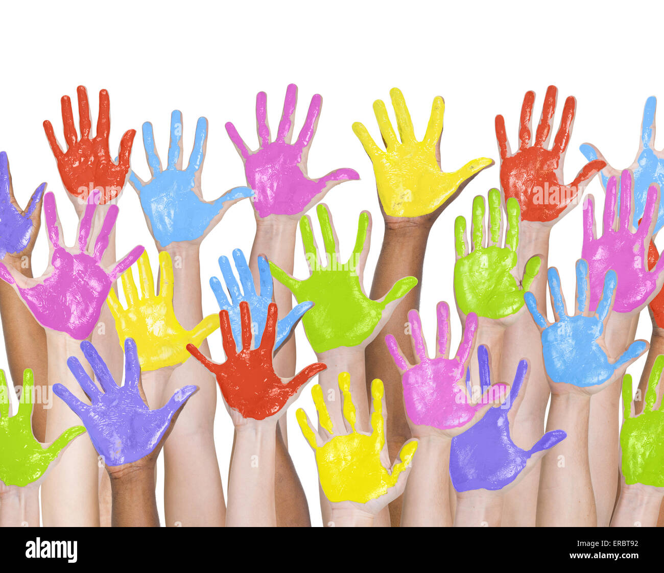 Multi ethnic people's colorful pinted hands raised Stock Photo - Alamy