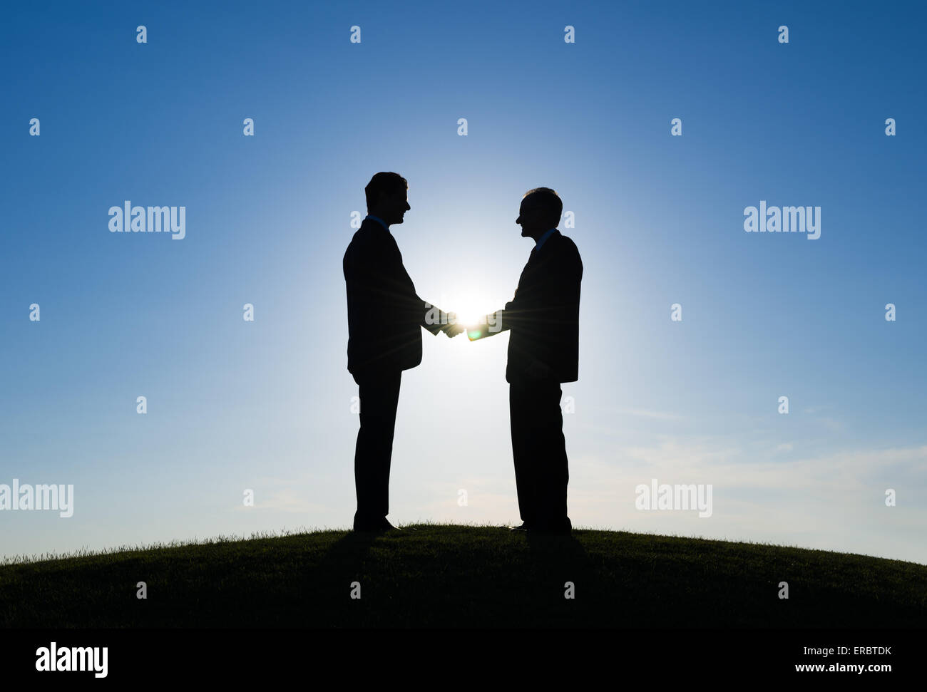 Two Businessmen handshake for agreement Stock Photo - Alamy