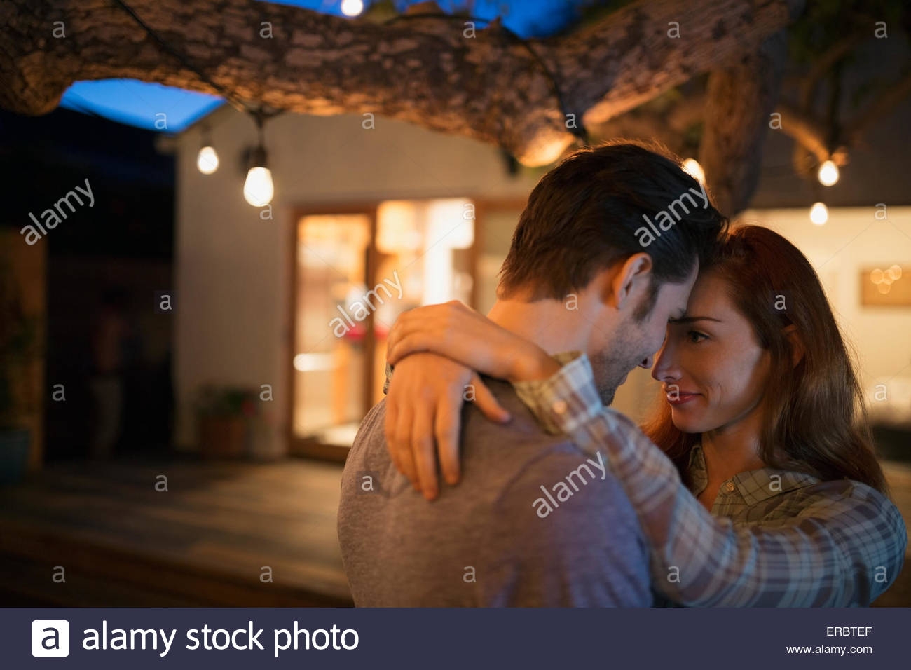 Love couple under tree hi-res stock photography and images - Alamy