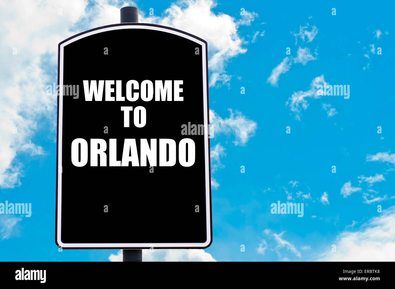 Black road sign with greeting message WELCOME TO ORLANDO isolated over ...
