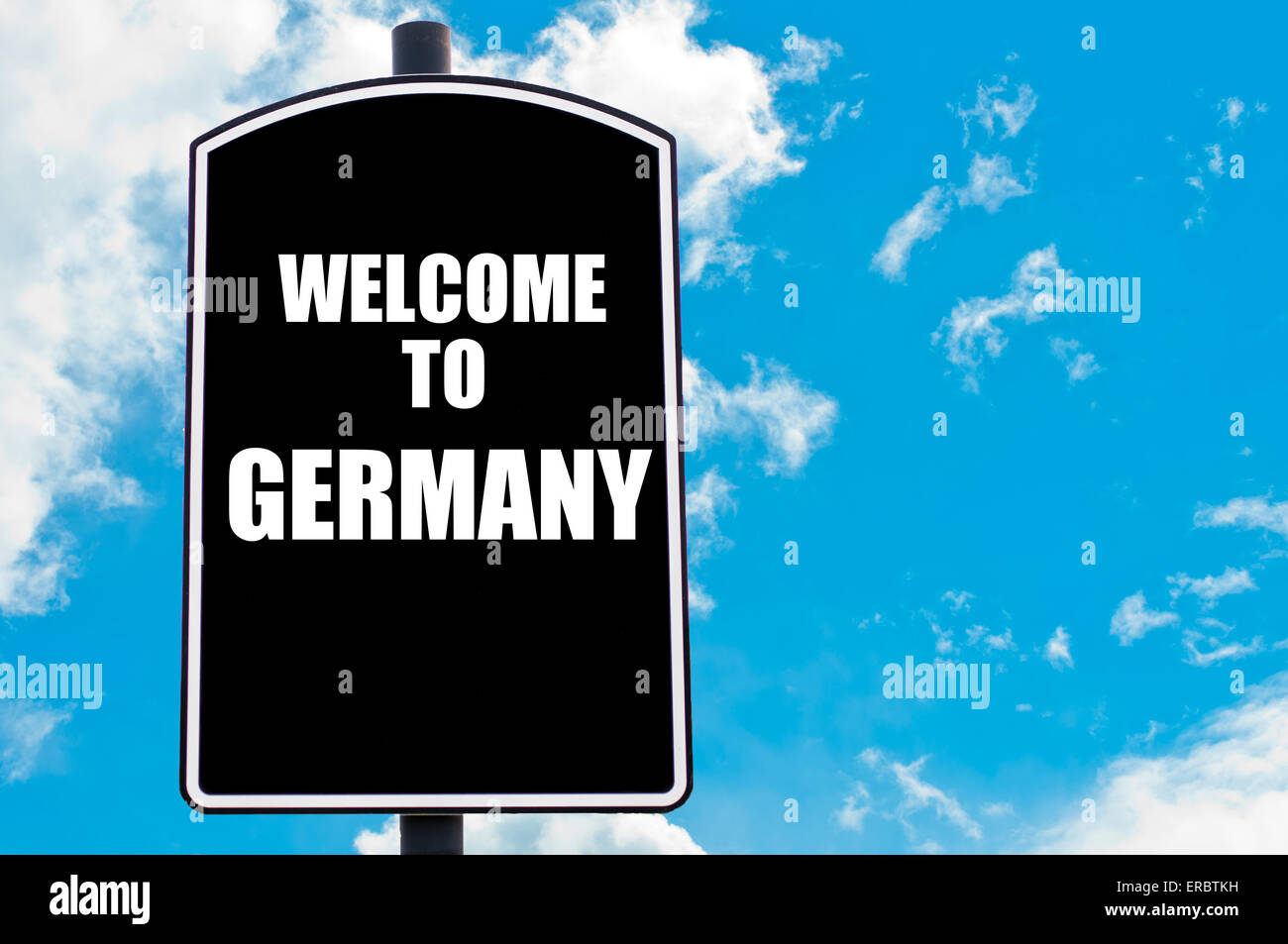 Black road sign with greeting message WELCOME TO GERMANY isolated over ...