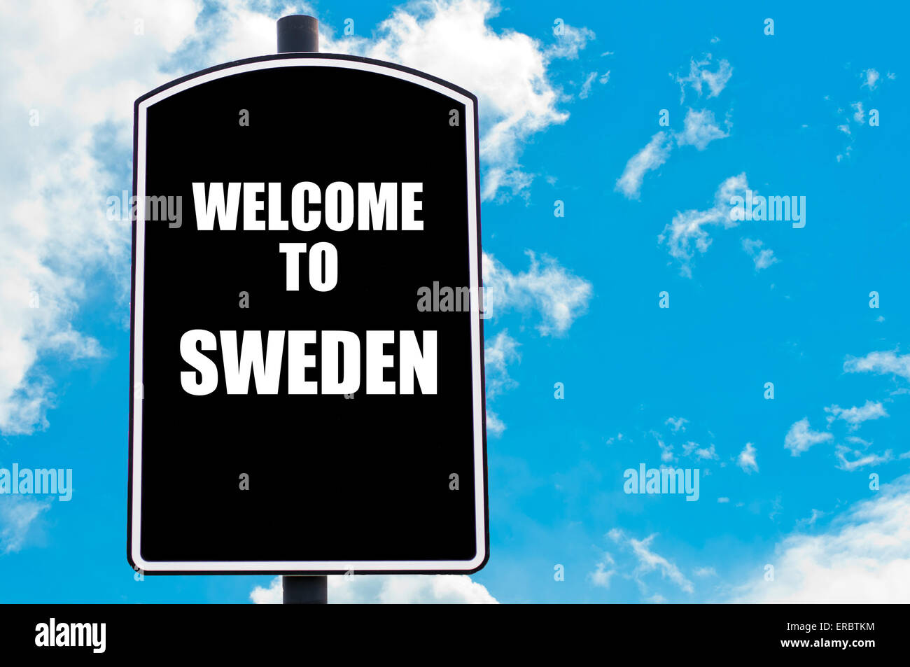 Black road sign with greeting message WELCOME TO SWEDEN isolated over ...