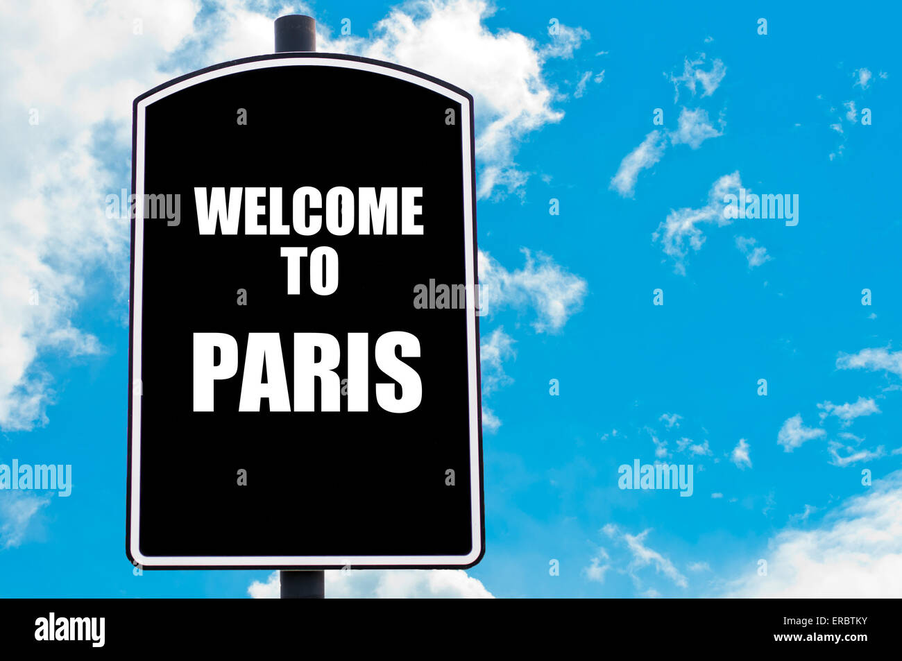 Black road sign with greeting message WELCOME TO PARIS isolated over ...