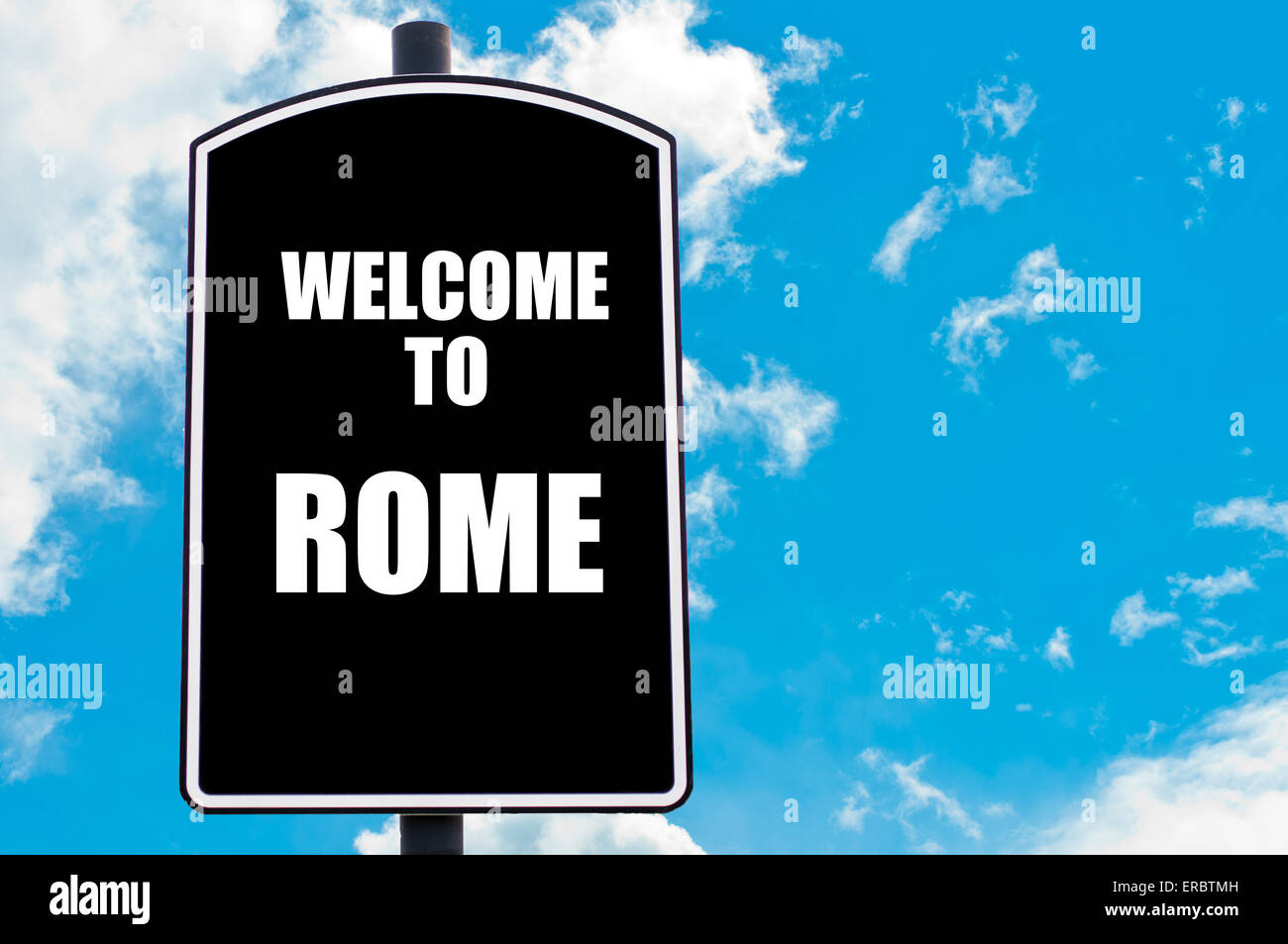 Black road sign with greeting message WELCOME TO ROME isolated over ...