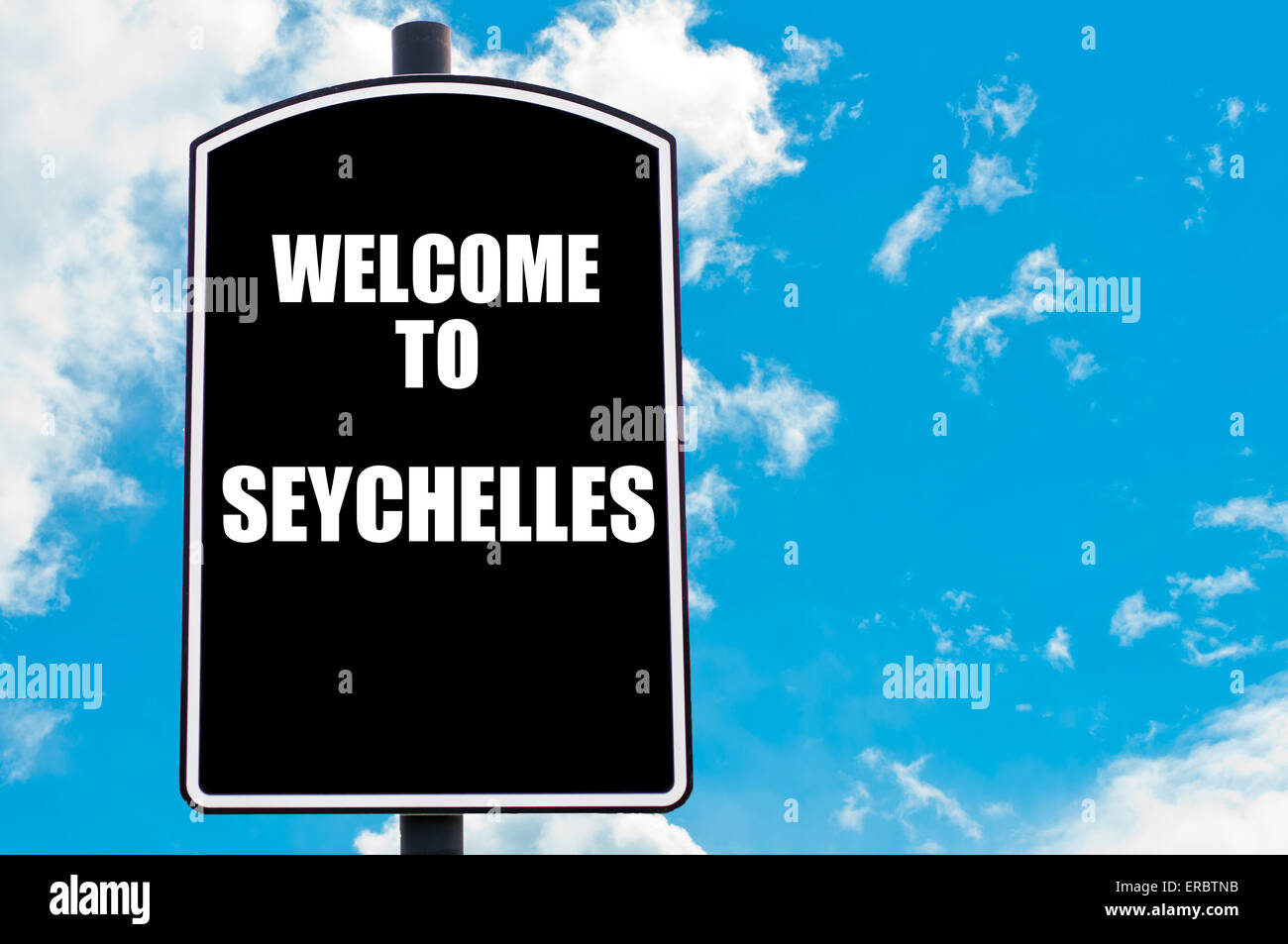 Black road sign with greeting message WELCOME TO SEYCHELLES isolated ...