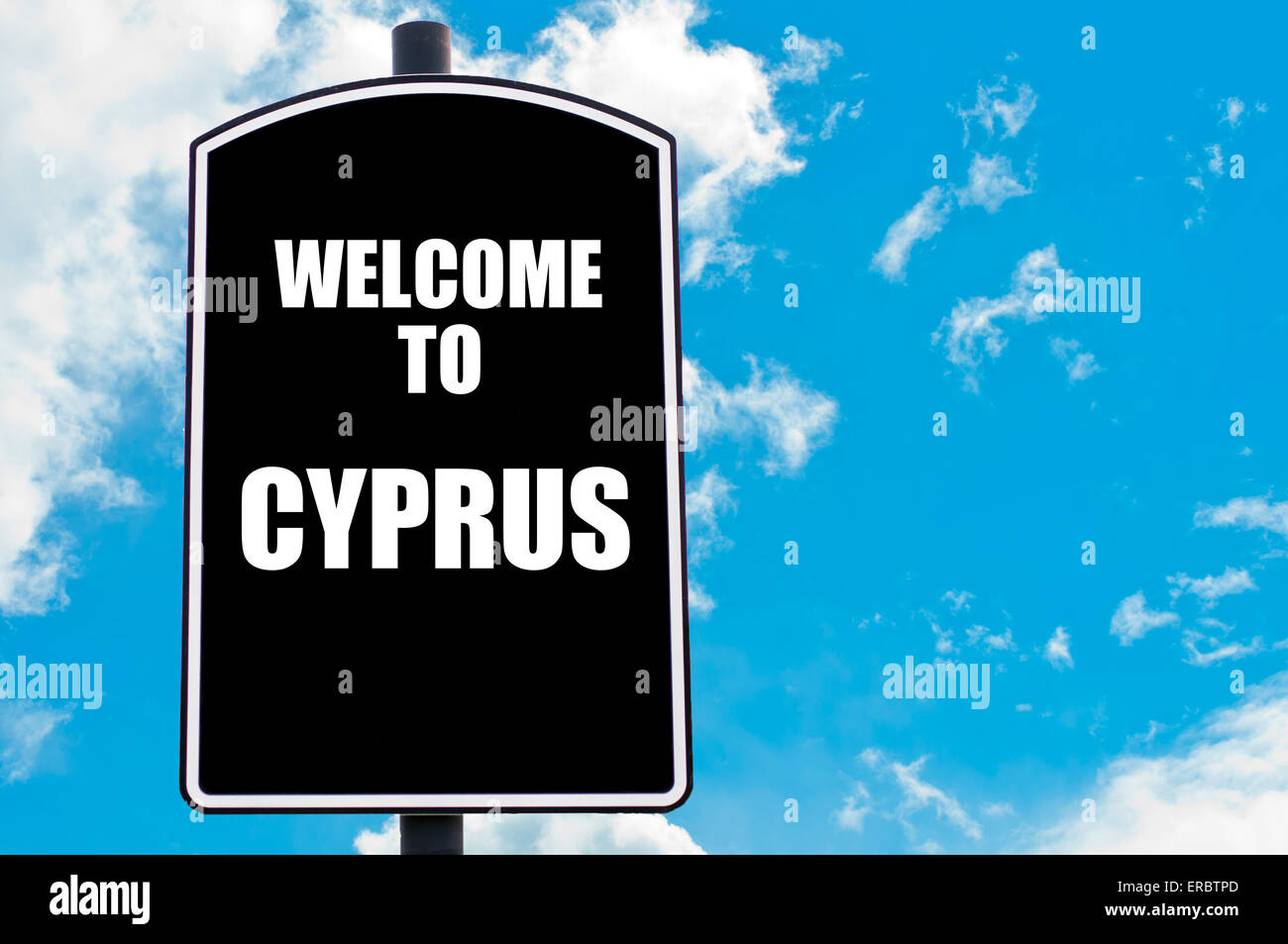 Black road sign with greeting message WELCOME TO CYPRUS isolated over ...