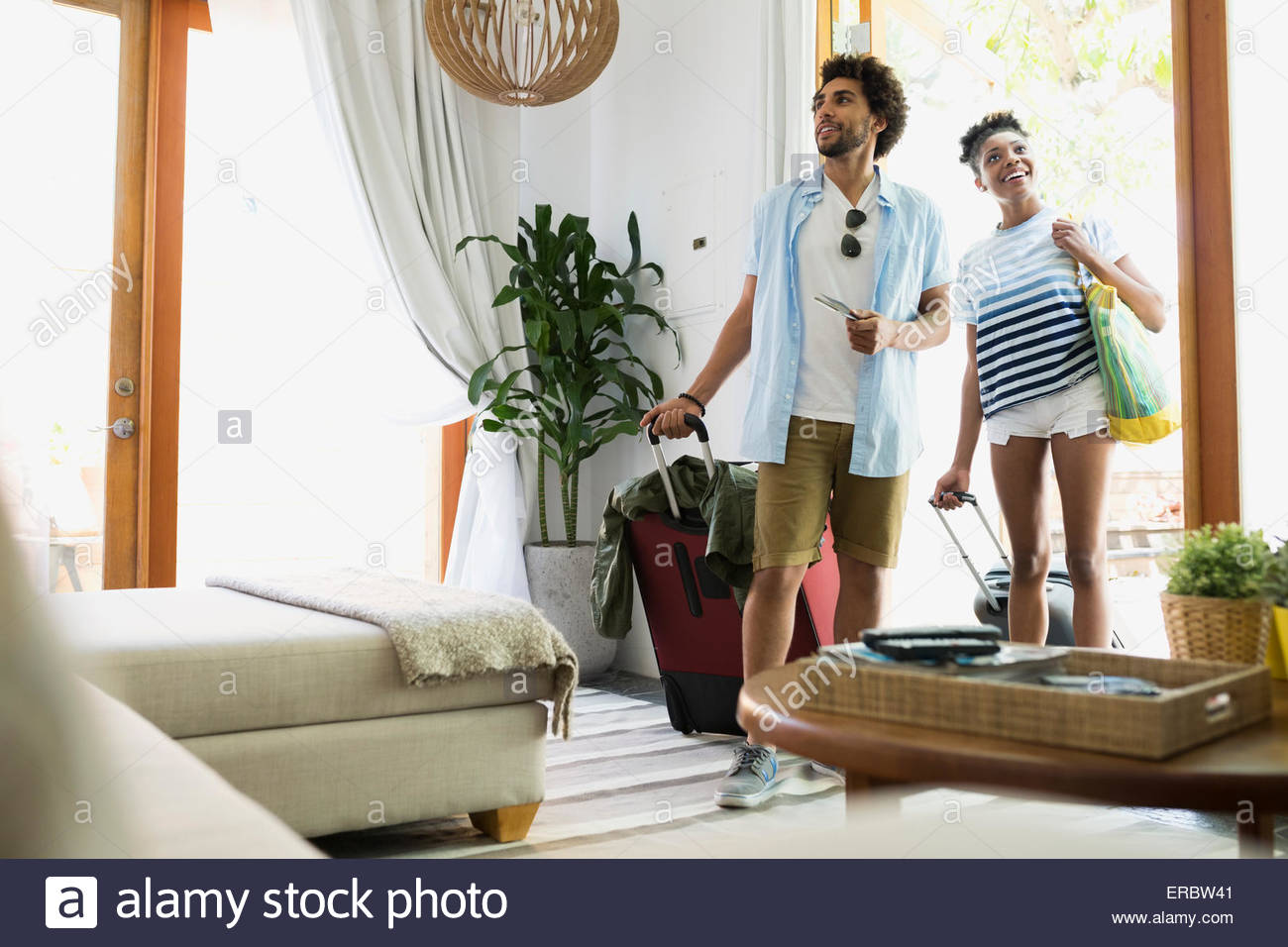 Person entering house hi-res stock photography and images - Alamy