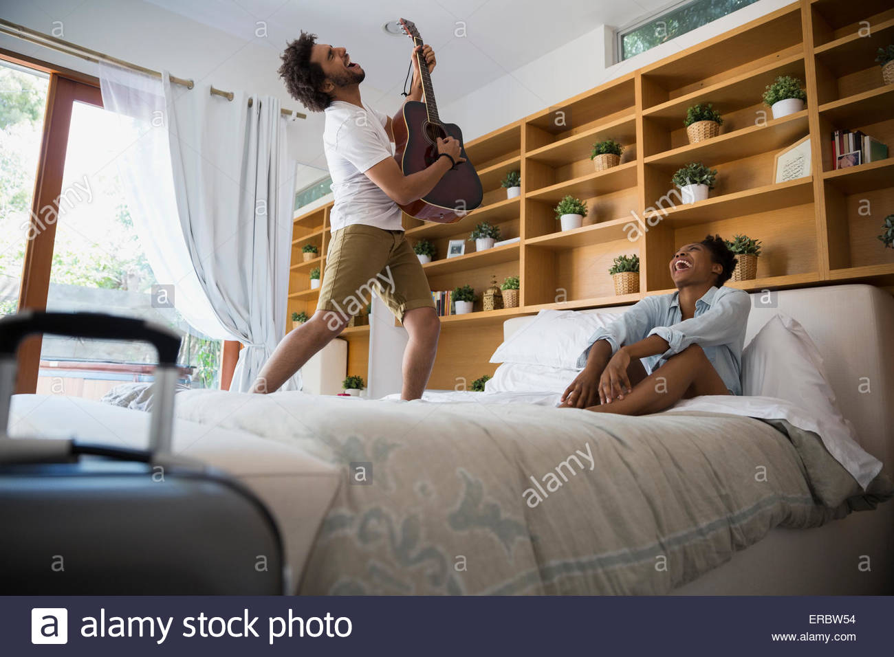 Women man bed hi-res stock photography and images - Alamy
