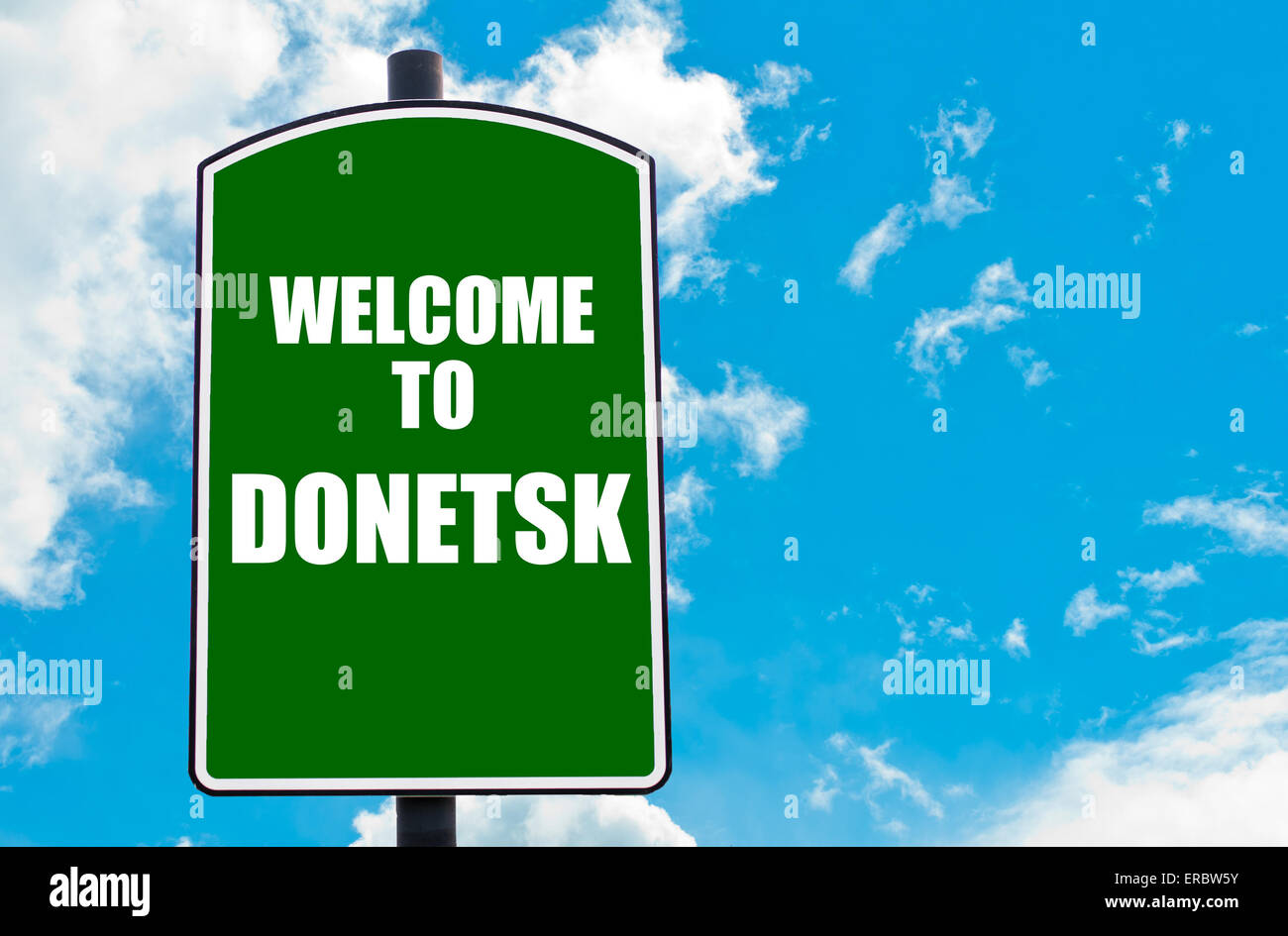 Green road sign with greeting message WELCOME TO DONETSK, UKRAINE ...