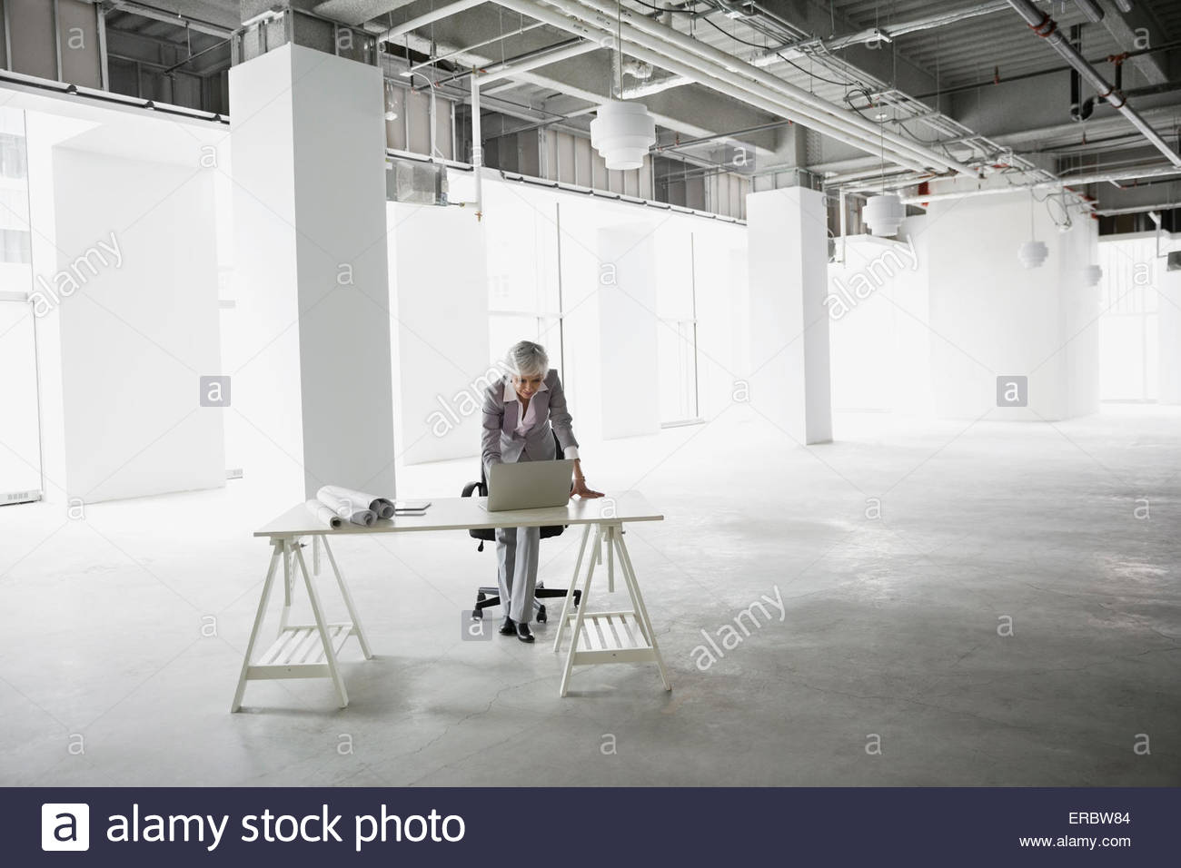 Empty loft office with laptop hi-res stock photography and images - Alamy