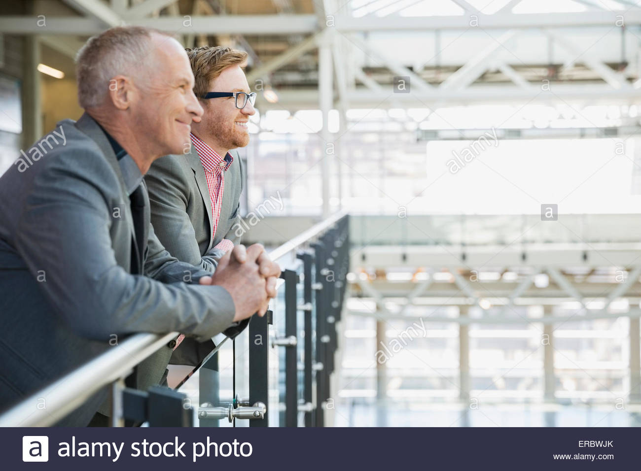 Pensive businessman leaning on railing hi-res stock photography and ...
