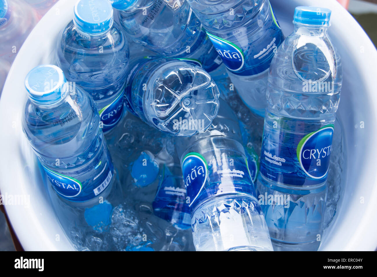 A bucket of bottled waters Stock Photo - Alamy