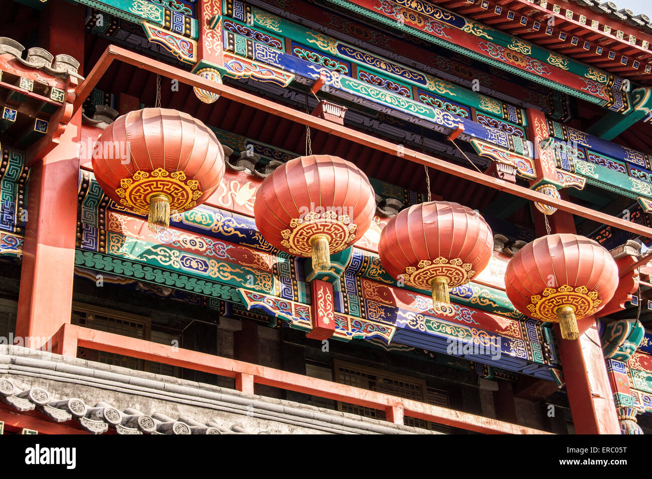 Chinese lanterns decorate the outside of a building in Beijing, China ...