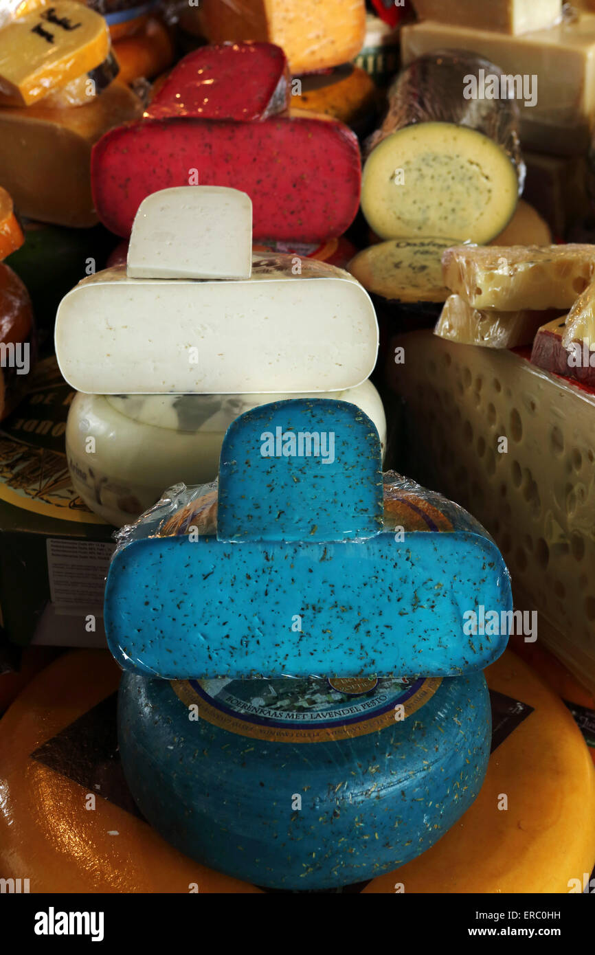 A Dutch cheese stall, with naturally dyed red, white and blue cheeses ...