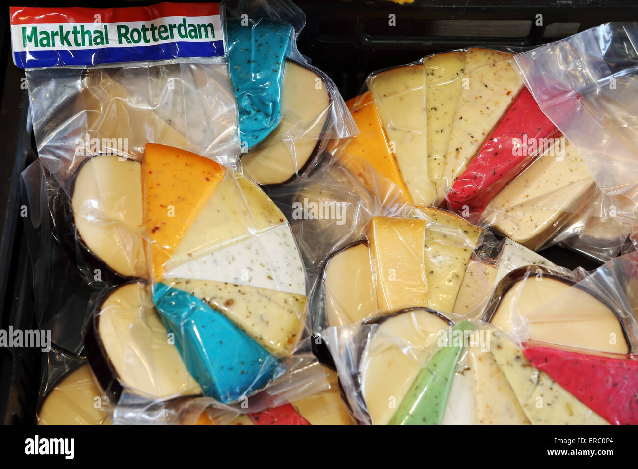 Pre-packed Dutch cheese selections at a stall at the Markthal in ...