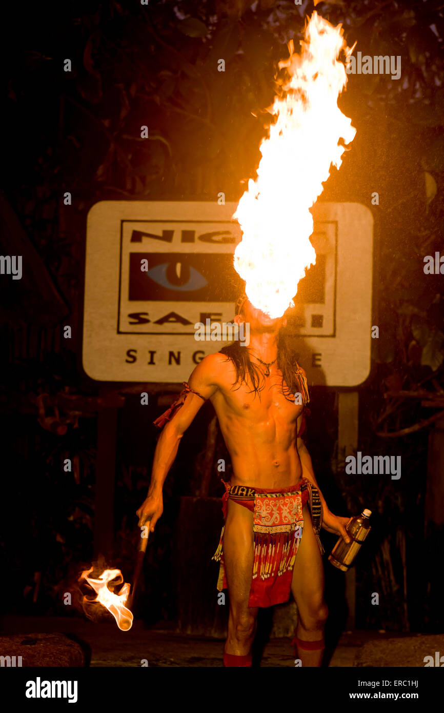 Fire dancers perform for an audience in the entrance to the Night ...