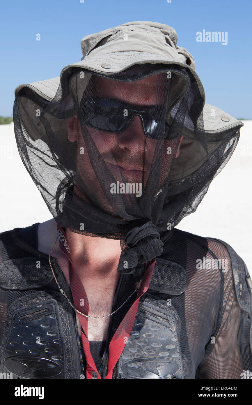 Model Released - Gary Jamieson wearing black net to stop the many flies ...