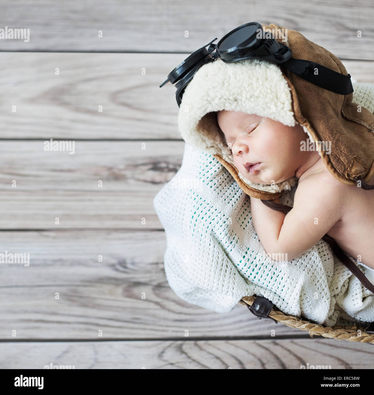 Cute little boy sleeping with pilot goggles Stock Photo - Alamy