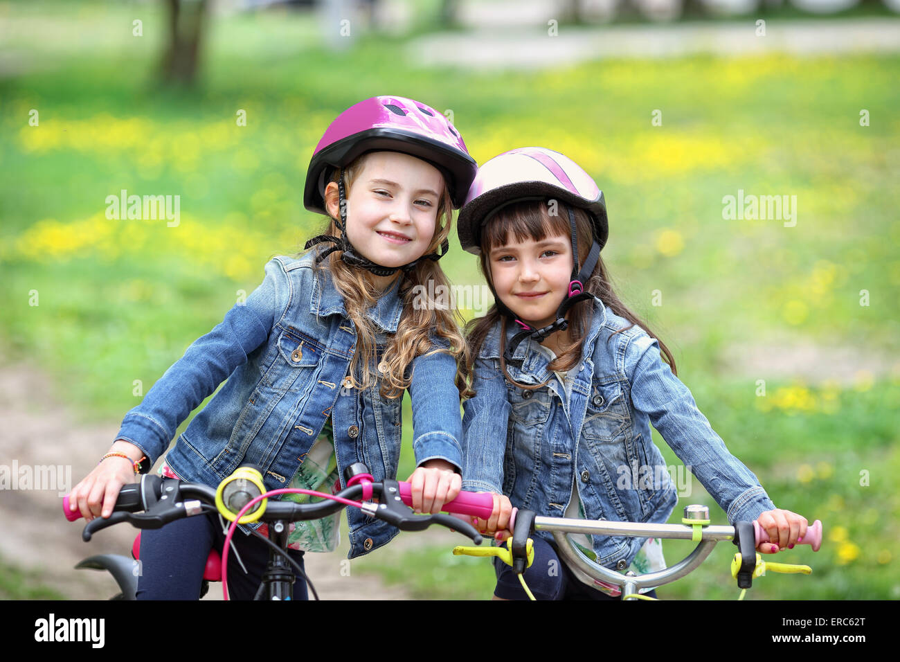 Two young friends on bicycles Stock Photo - Alamy