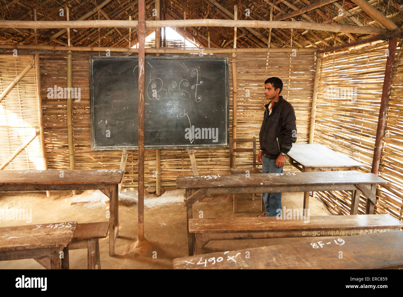 Teacher in classroom in Sanischhare Bhutanese Refugee Camp, Nepal Stock ...