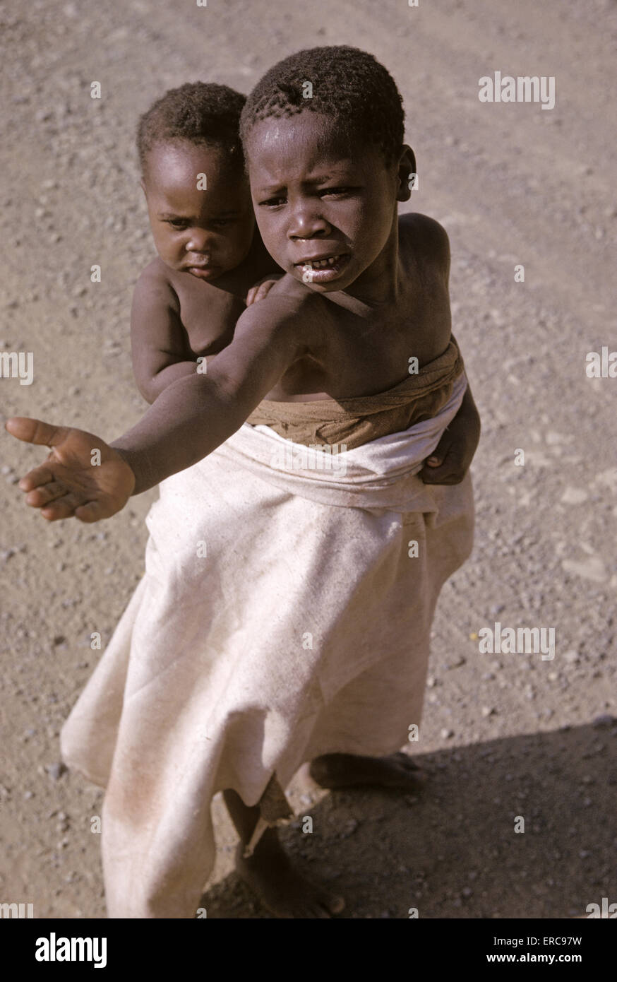 Poor child begging food hi-res stock photography and images - Alamy