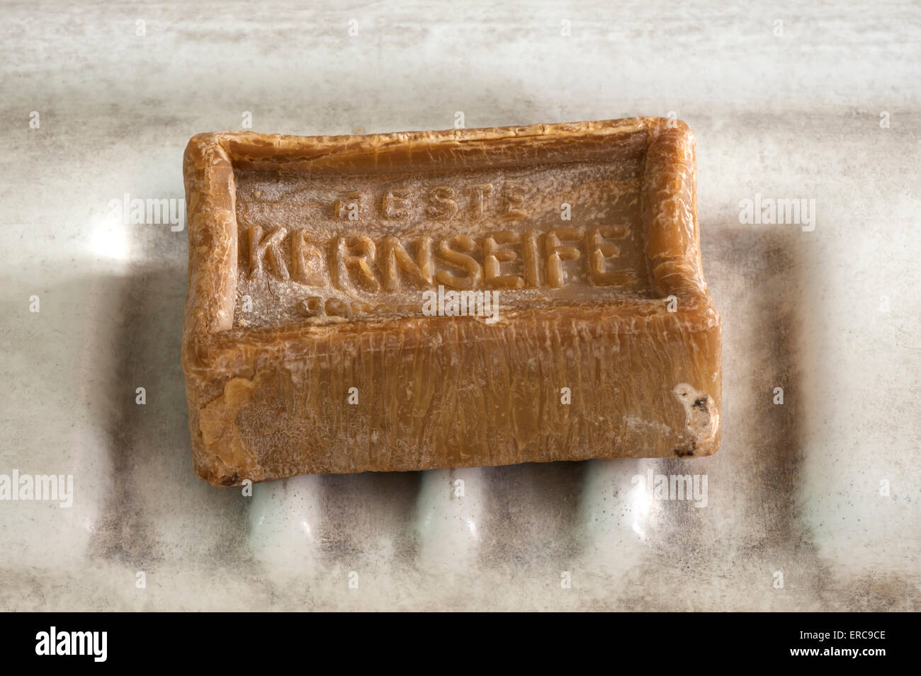 Piece of curd soap on an old sink in a former factory, today Museum of ...