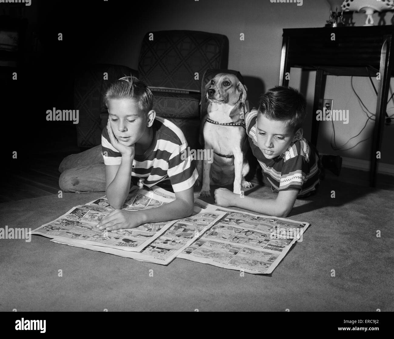 1950s boys reading hi-res stock photography and images - Alamy