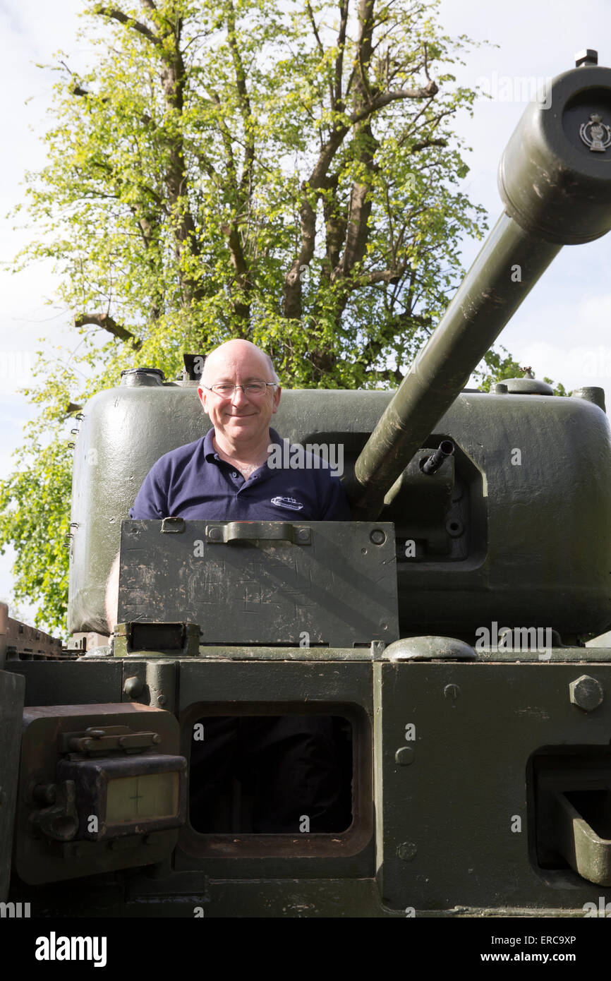 Westerham, UK,1st June 2015, The driver of a working World War two tank ...