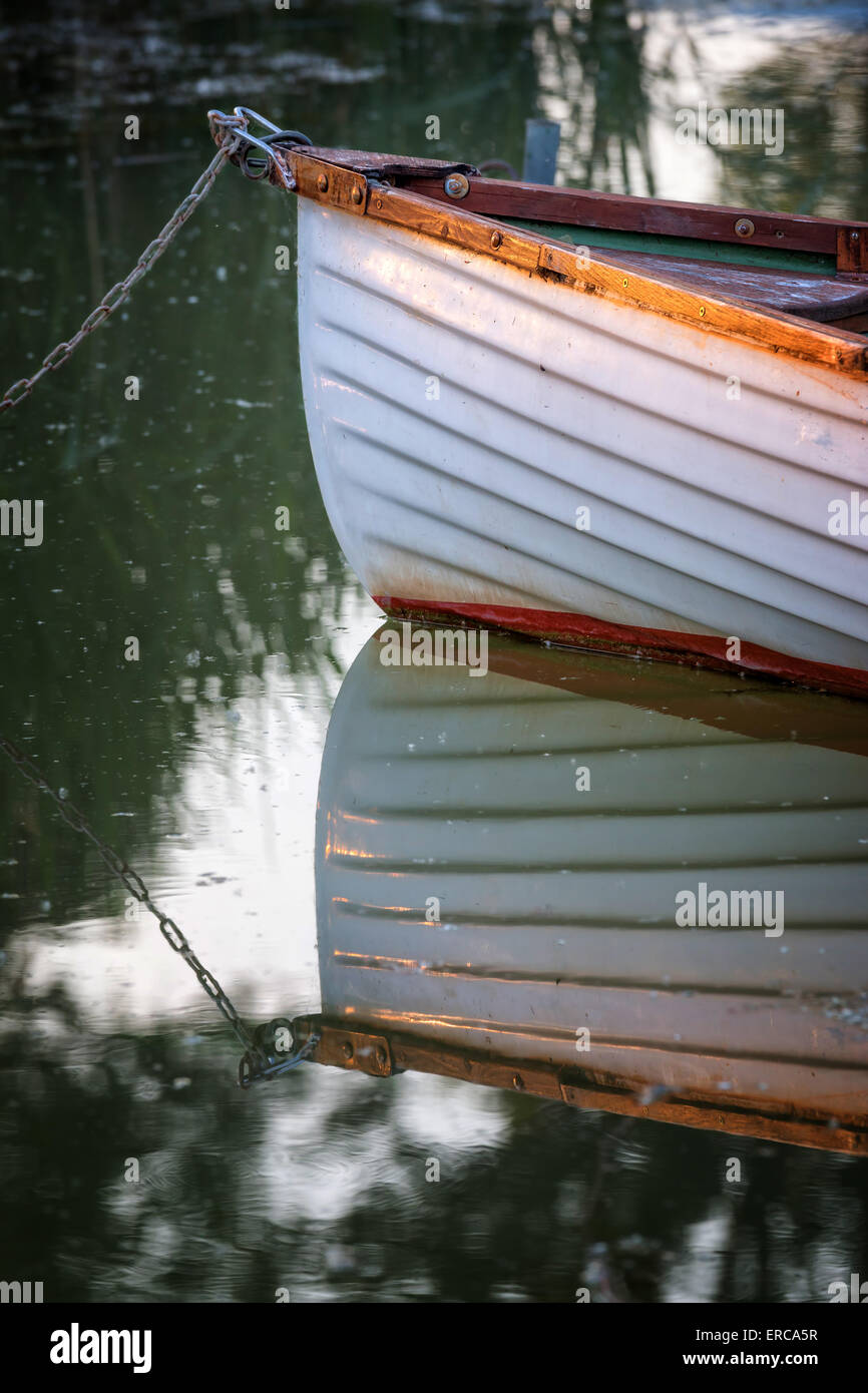 Still-life with boat at sunset Stock Photo - Alamy