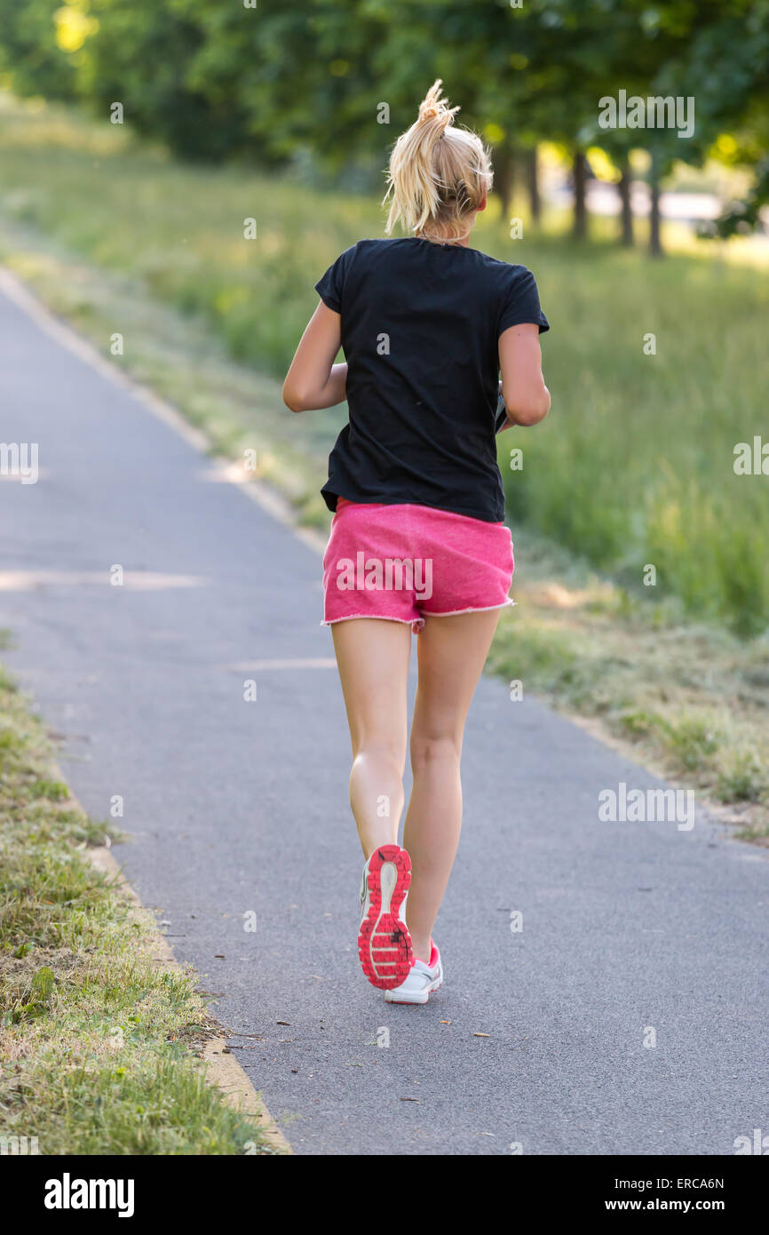 Young girl while training for a competition in spring Stock Photo - Alamy