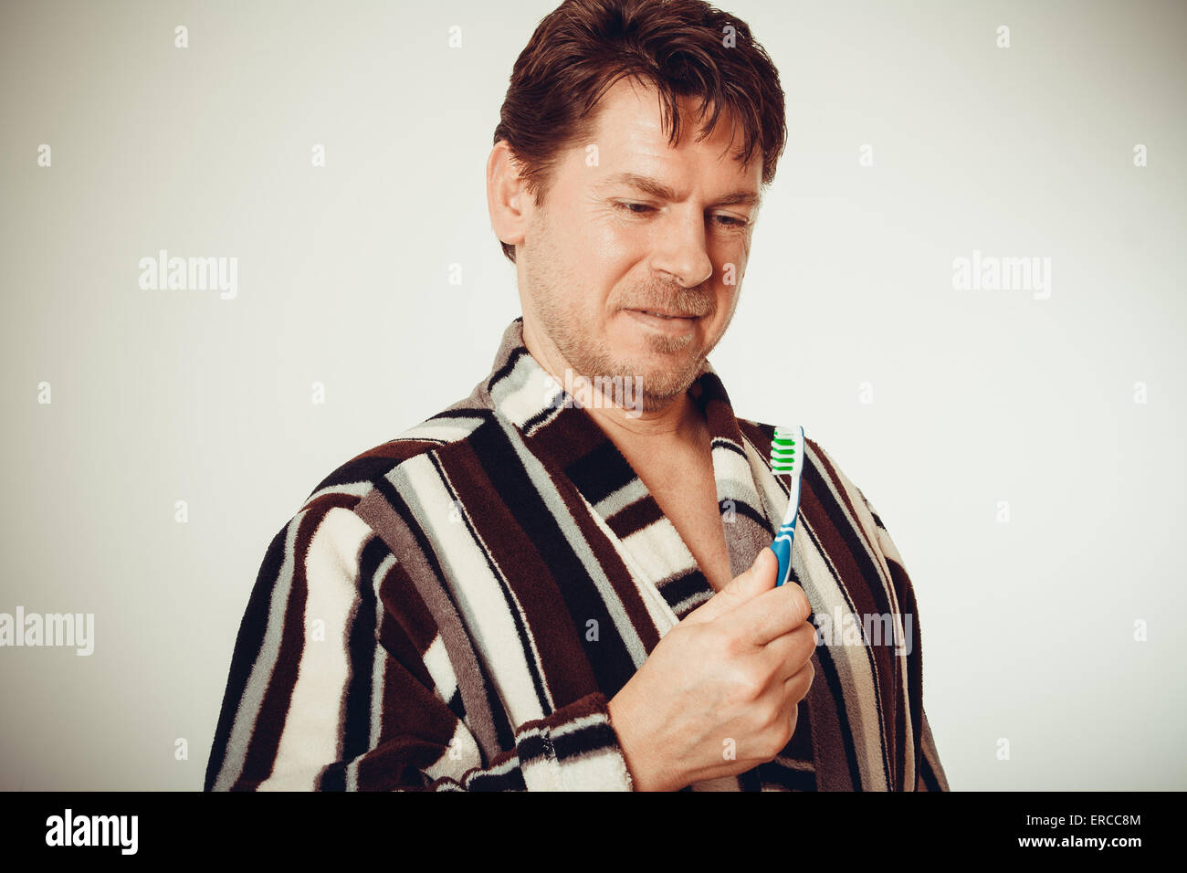 Young man brushing teeth tooth hi-res stock photography and images - Alamy