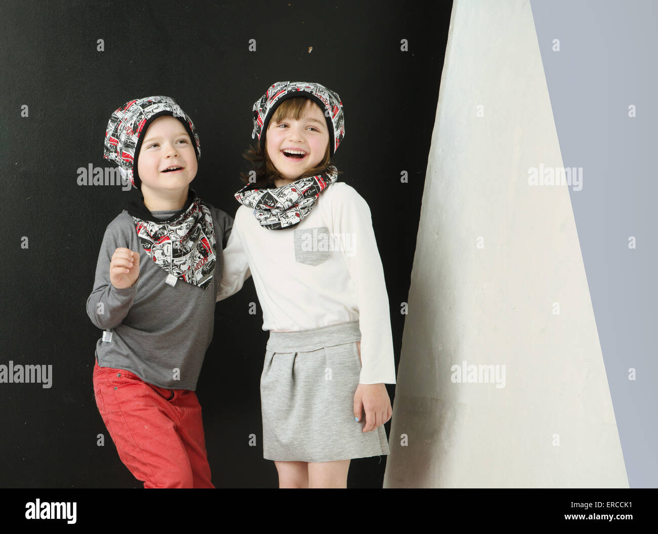 Two joyful kids posing together Stock Photo - Alamy