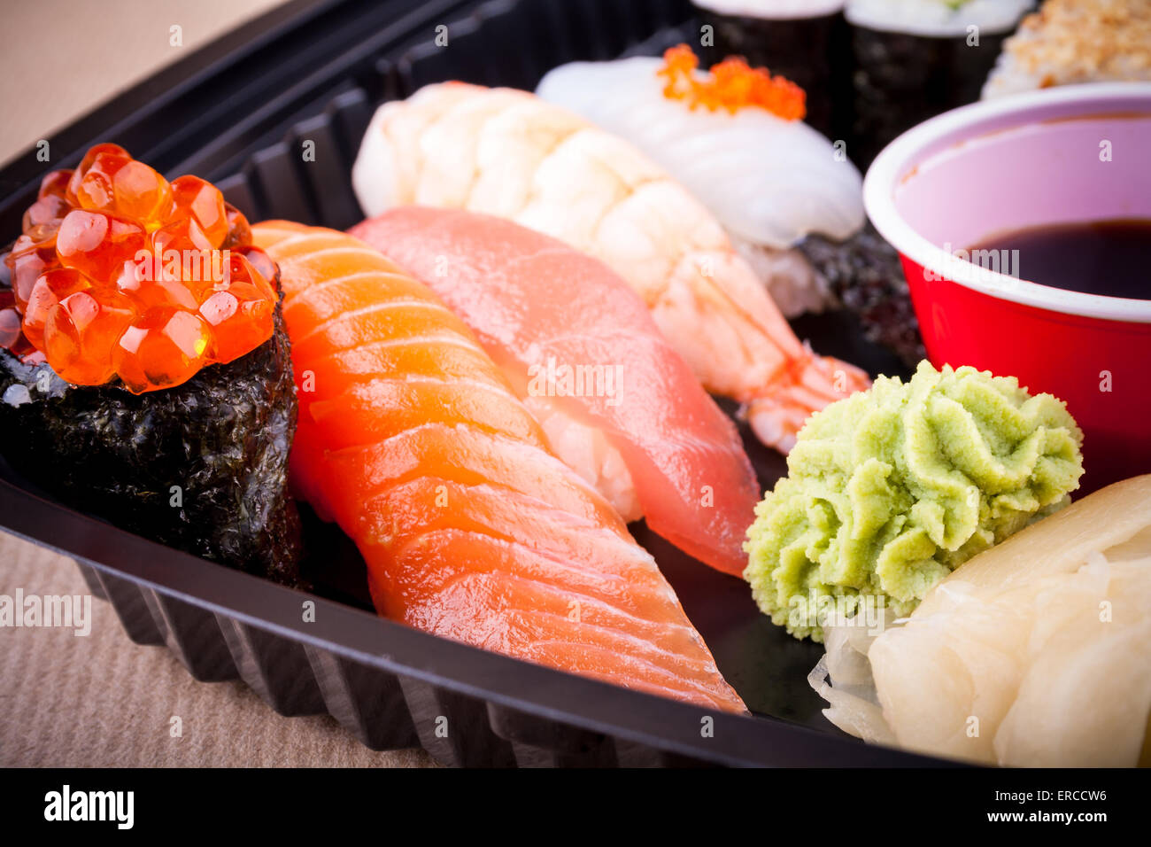 Assorted fish sushi with salmon caviar ikura, closeup Stock Photo - Alamy