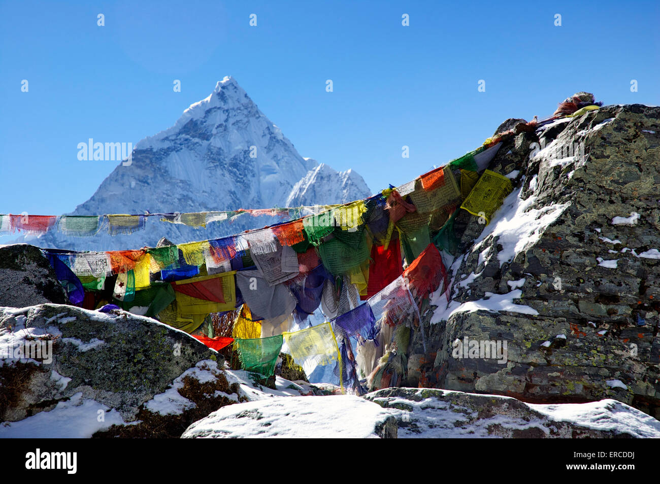 Buddhist prayer flags with Ama Dablam in the background Stock Photo - Alamy
