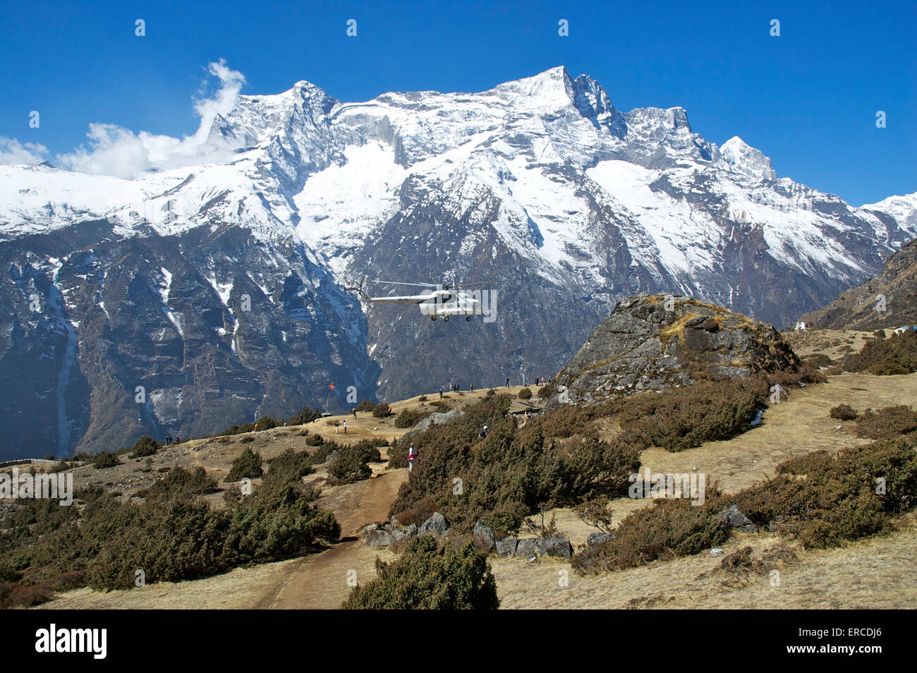 A helicopter hovering above Syangboche airfield, Nepal Stock Photo - Alamy