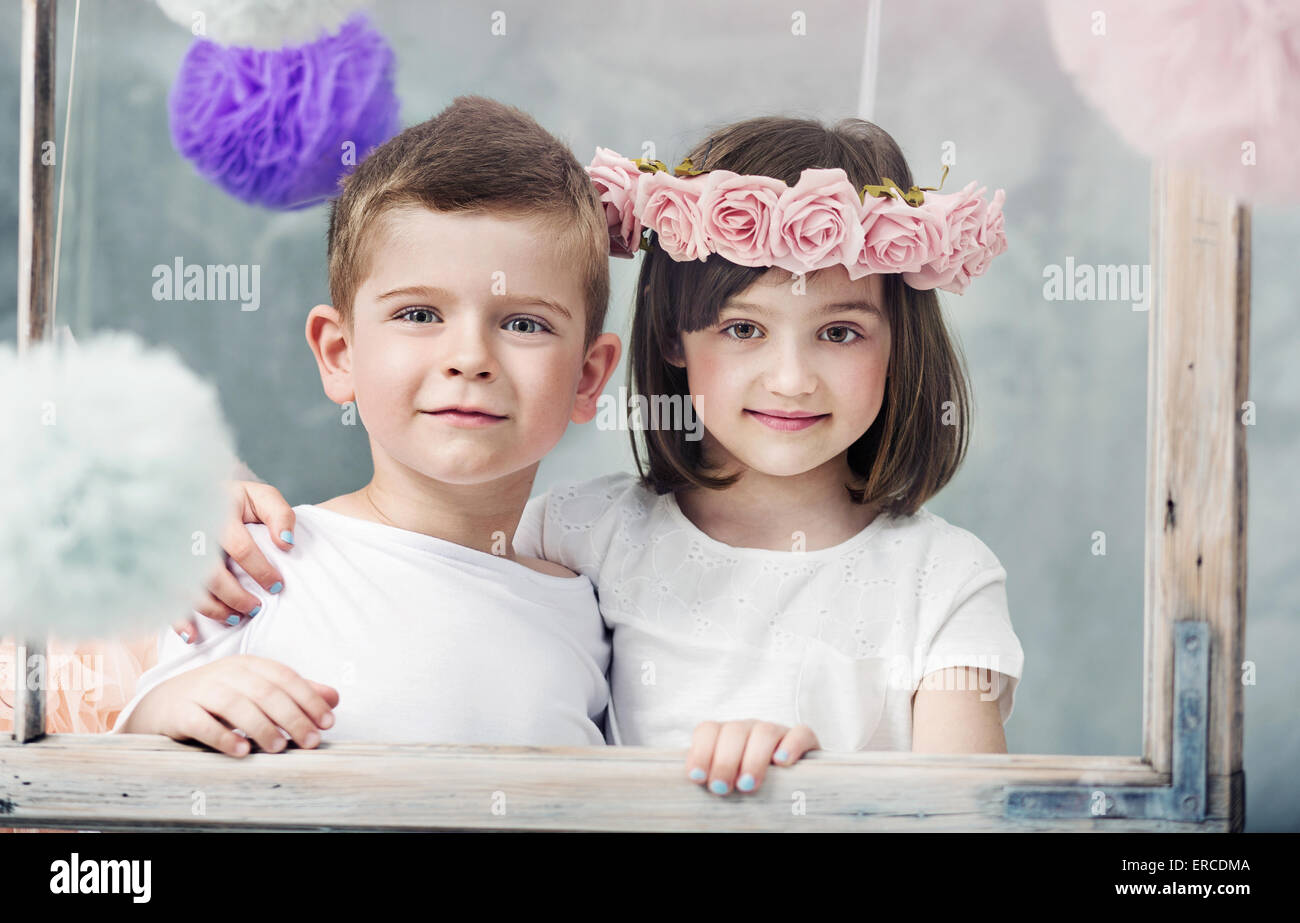 Charming little kids posing together Stock Photo - Alamy