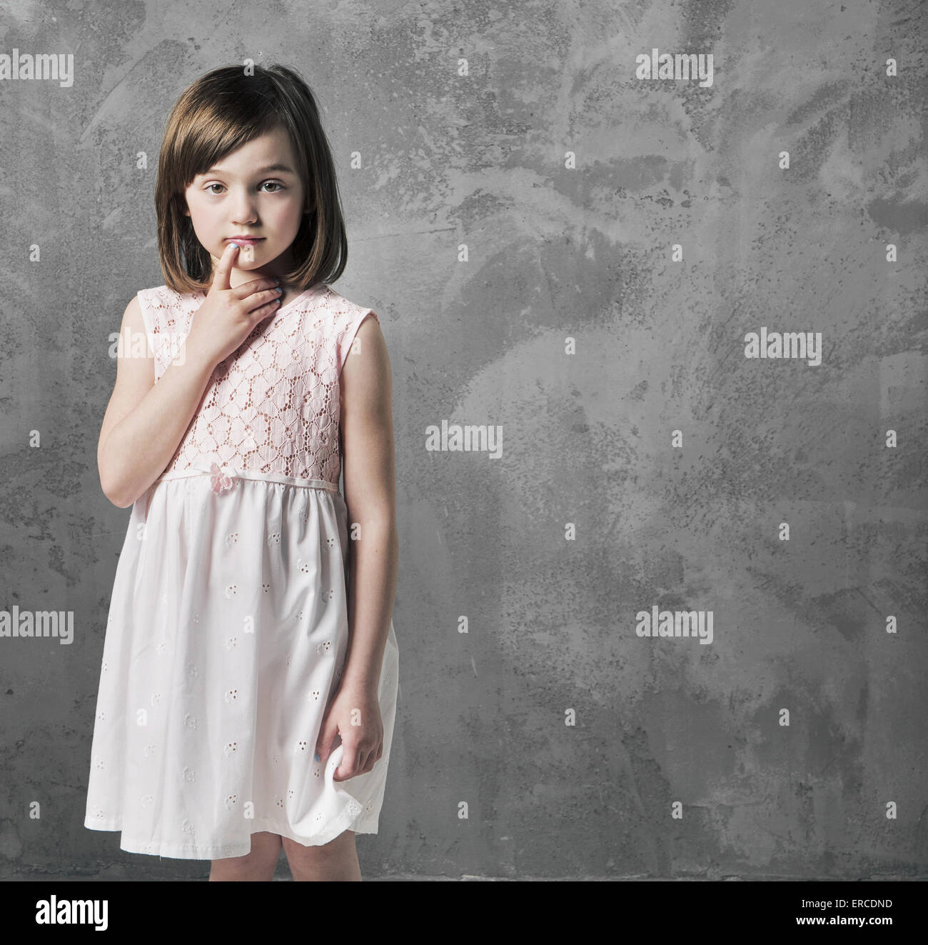 Portrait of a thoughtful little child Stock Photo - Alamy