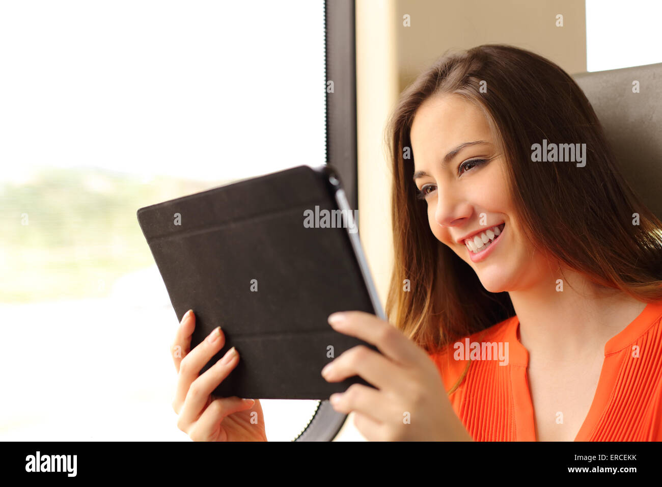 Train reading tablet hi-res stock photography and images - Alamy