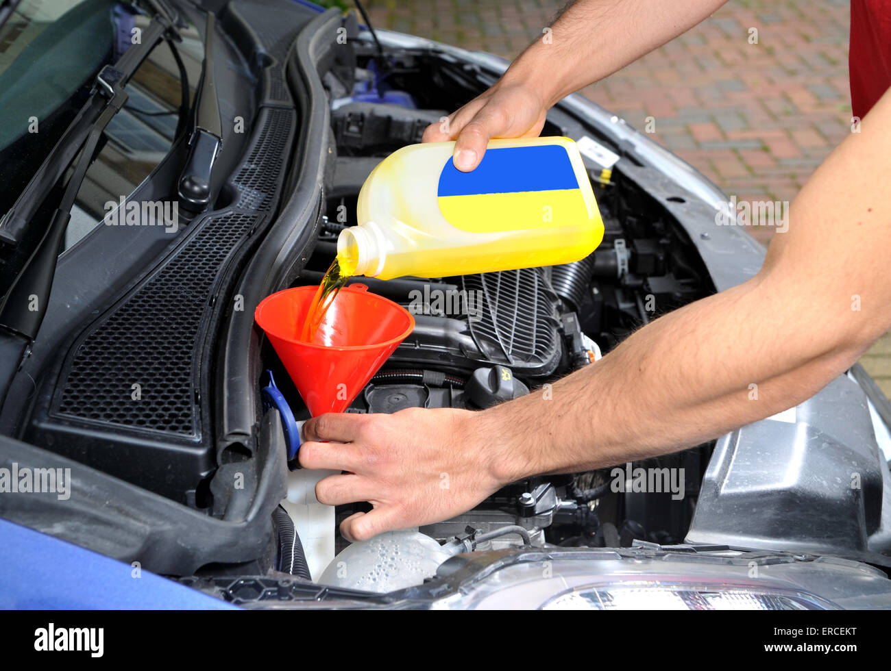 Topping up cars screen wash hi-res stock photography and images - Alamy