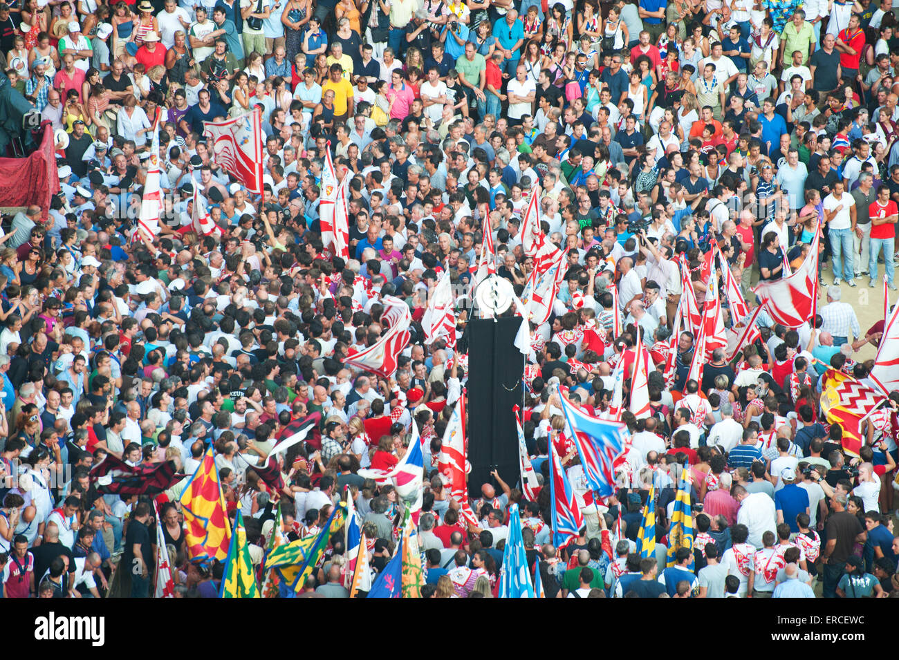 winning Contrada carrying the Palio after the horse race, Siena ...
