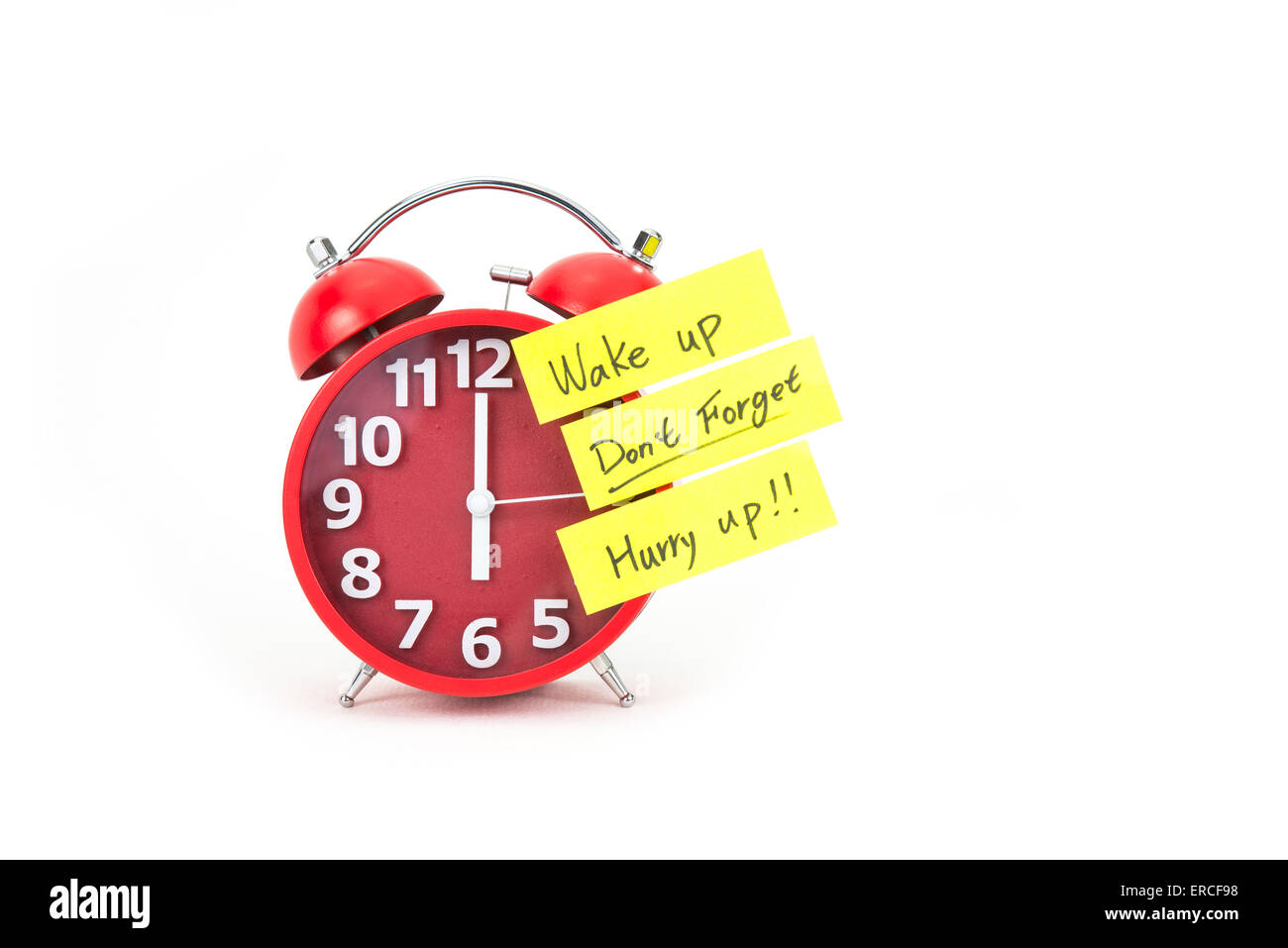 Yellow color alarm clock Cut Out Stock Images & Pictures - Alamy