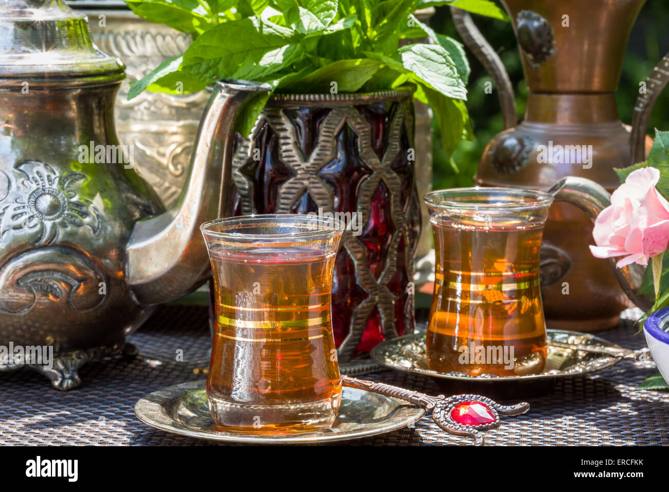 Arabian mint tea served in the summer garden Stock Photo - Alamy