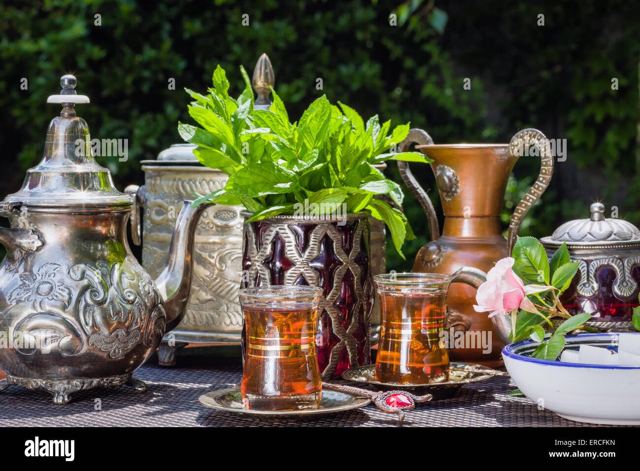 Arabian mint tea served in the summer garden Stock Photo - Alamy
