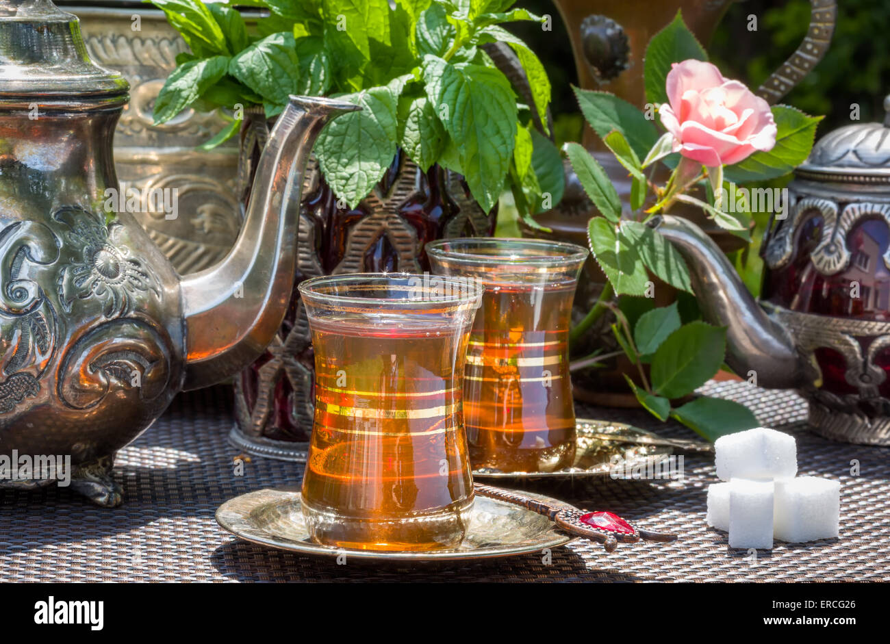 Arabian mint tea served in the summer garden Stock Photo - Alamy