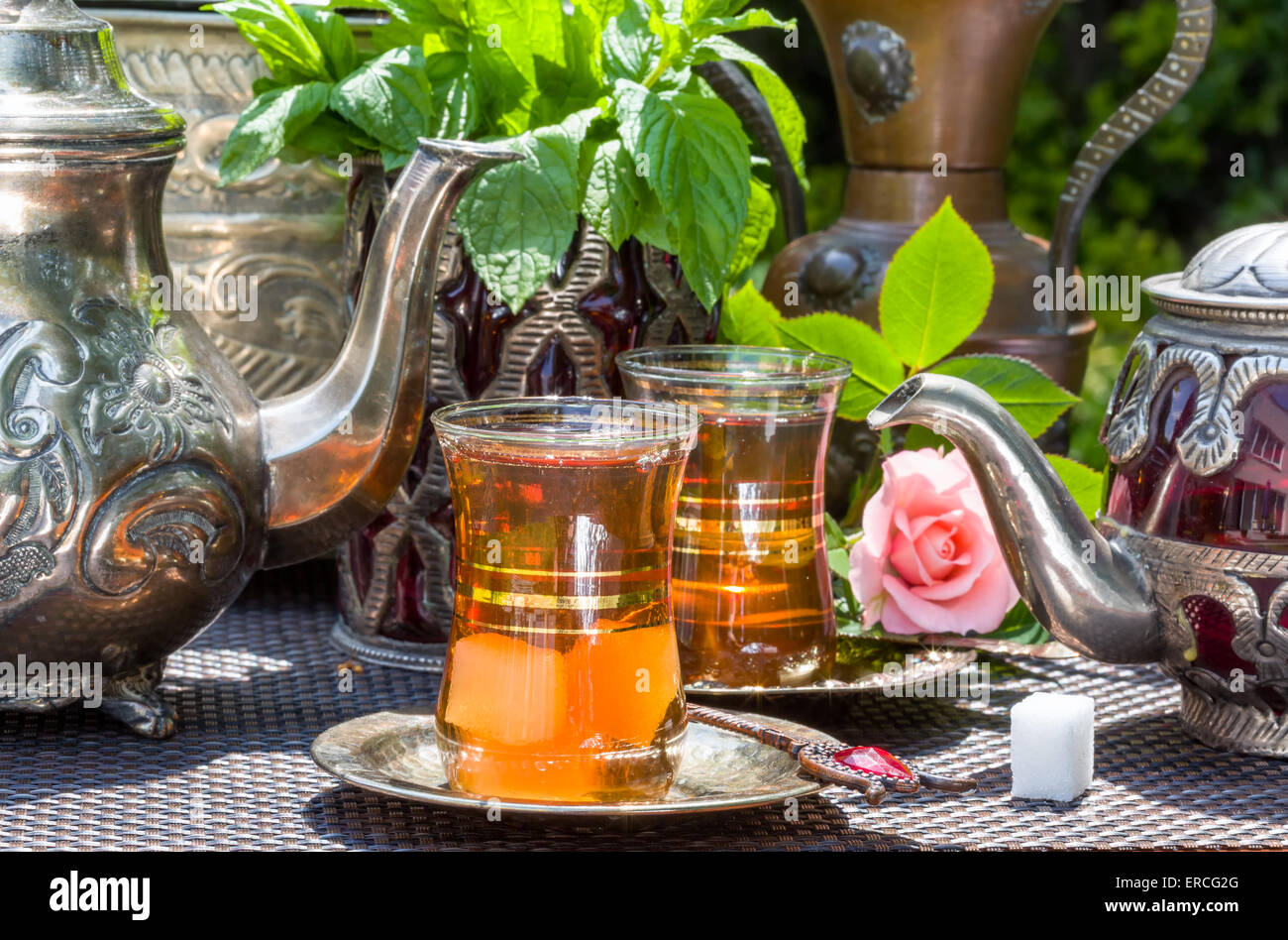 Arabian mint tea served in the summer garden Stock Photo - Alamy