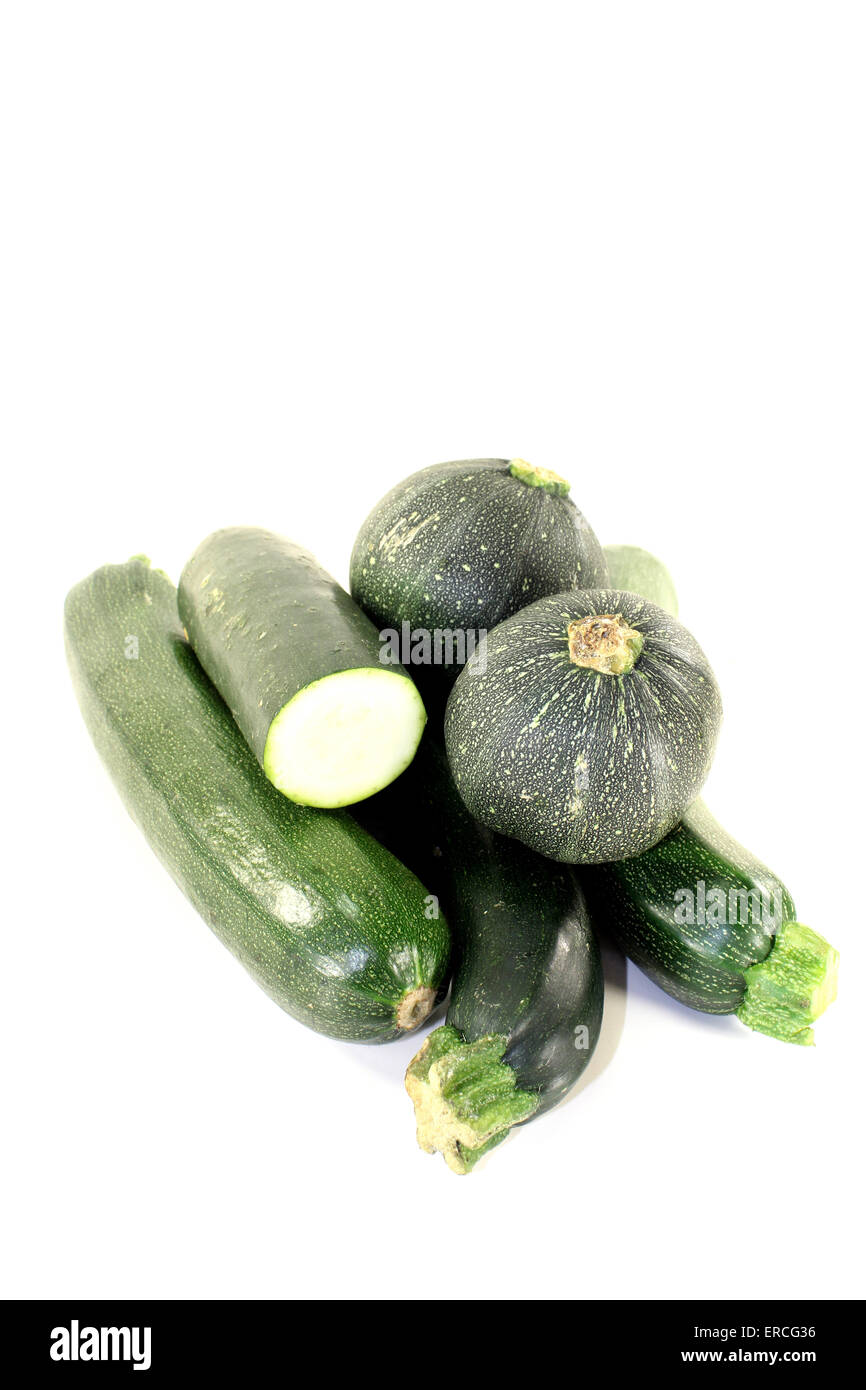 fresh green Courgette mixed on a light background Stock Photo - Alamy