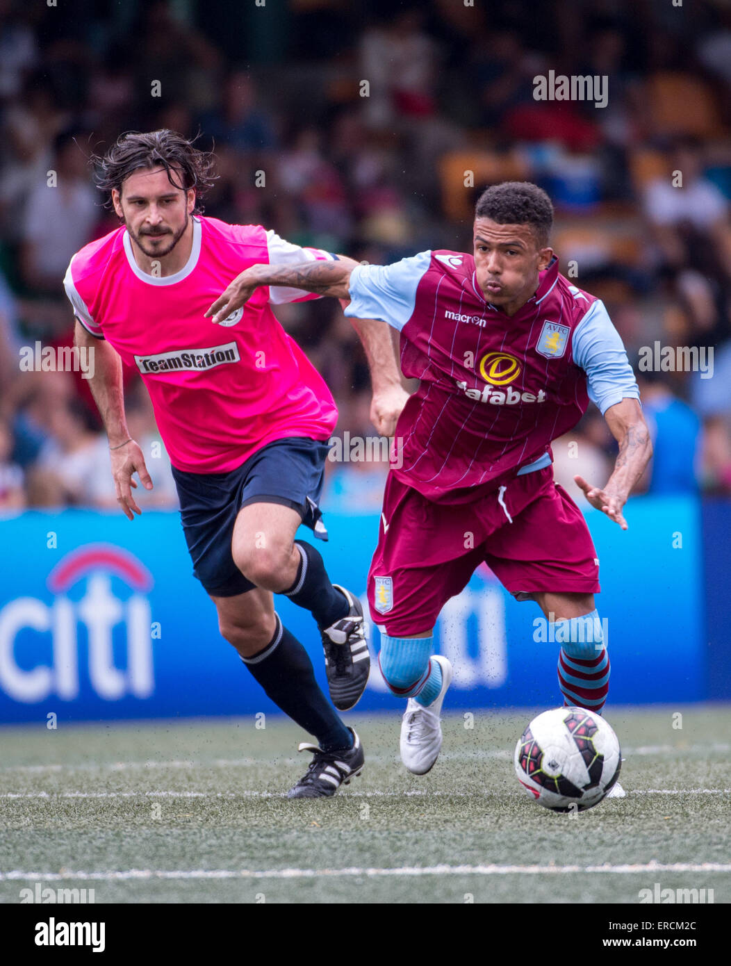 Hong Kong, China. 31st May, 2015. Jerell Sellars (R) Aston Villa ...