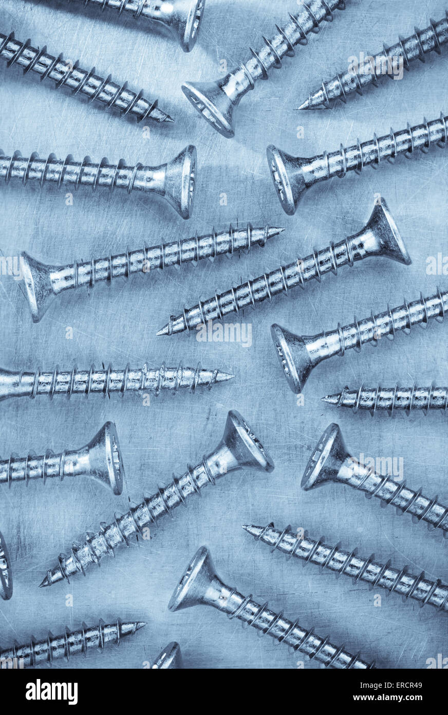 screws tool at metal background texture Stock Photo - Alamy